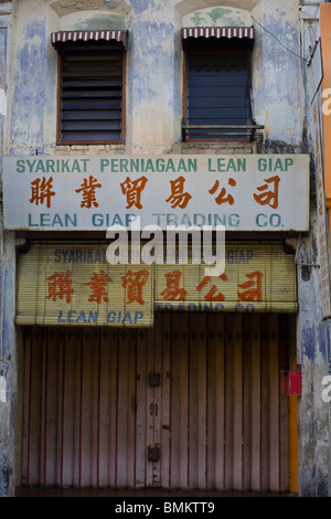 Traditional shops and their mandarin billboards in the old chinese ...