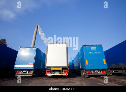 Parked Finnish peat transport trucks , Finland Stock Photo - Alamy