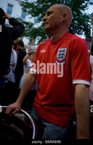 Fans of USA and England football teams cheer during their match at ...