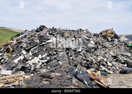 Big pile of asphalt roofing shingles and trash at landfill Stock Photo ...