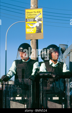 RUC Royal Ulster Constabulary policeman officer takes aim shoots at a ...