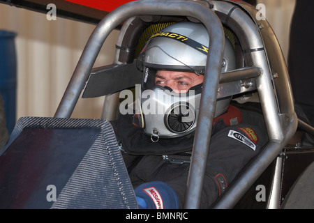 Cockpit in a drag racing car showing components and parts such as ...