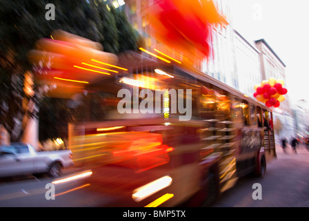 Chinese New Year motorized cable car with balloons joins the parade ...