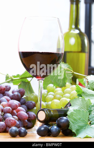 Glass and bottle of wine composition Stock Photo - Alamy