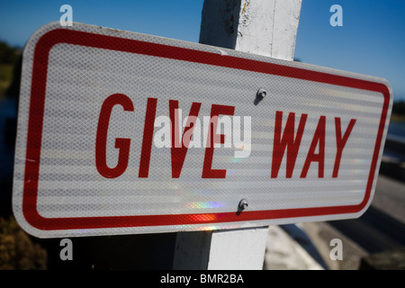 A give way road sign, New Zealand Stock Photo - Alamy