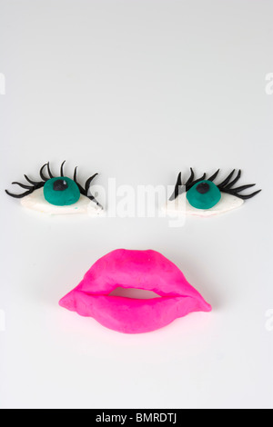 Plasticine figurines, Female face, eyes and lips Stock Photo - Alamy