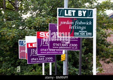 Estate agents signs Stock Photo - Alamy