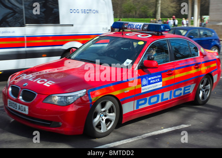 Red BMW Metropolitan police car driving through the City of London ...
