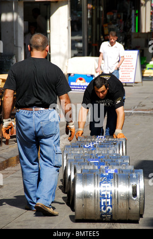 Delivery of beer kegs to a bar in Kampong Glam area of Singapore Stock ...