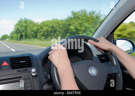 Driver view at speeding car dashboard and motorway at night Stock Photo ...