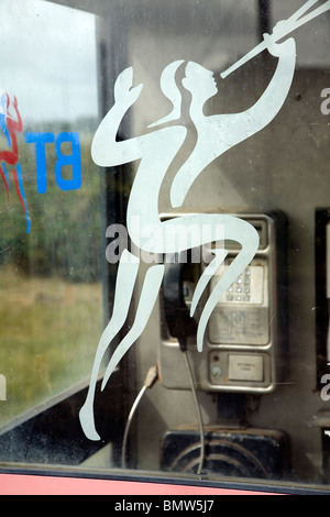 BT phone box with piper logo surrounded by cow parsley Stock Photo - Alamy