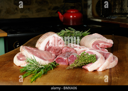 Stock photo of a selection of raw pork products on a wooden kitchen ...