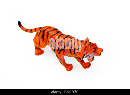 Plastic toy tiger figurine isolated on white background Model Release ...