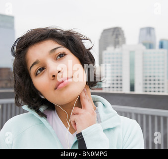 Young woman checking her pulse on wrist at home, closeup Stock Photo ...
