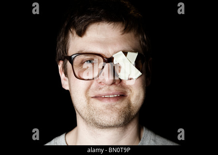 Portrait of a silly guy looking weird Stock Photo - Alamy