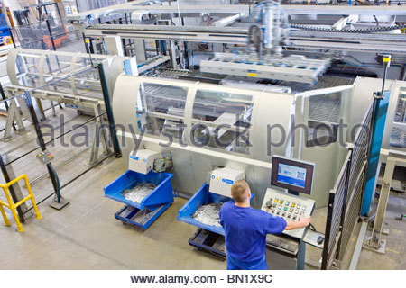 computer controlled automated manufacturing process, industrial robot ...