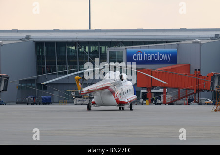 The Polish Air Force PZL W-3 Sokol (Falcon) flying over meadow during ...