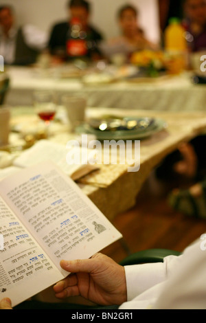 An israeli family attending a "Seder", the traditional passover dinner ...
