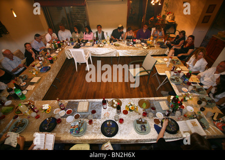 An israeli family attending a "Seder", the traditional passover dinner ...