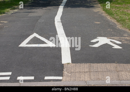A cycle lane splitting the pavement Stock Photo - Alamy