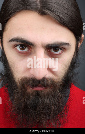 Portrait of angry furious man with mustache standing standing and ...