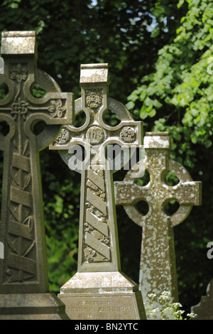 Stone crosses and tombstones in a cemetery. Black and white toned Stock ...