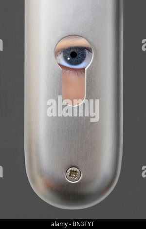 Woman with eye looking through keyhole peeping in mysterious way MR ...