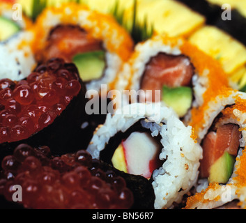 Fish roe Gunkan rolls Japanese Sushi Stock Photo - Alamy