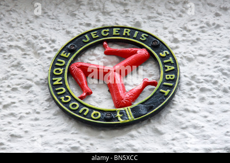 Isle of Man three-legged Triskelion logo on the side of a building next ...