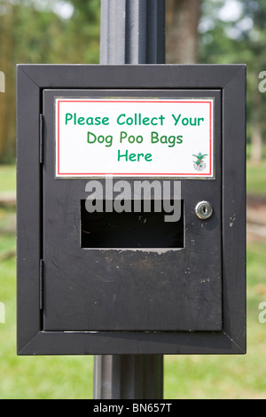Dog waste poo collection bin on a canal towpath walk Stock Photo - Alamy
