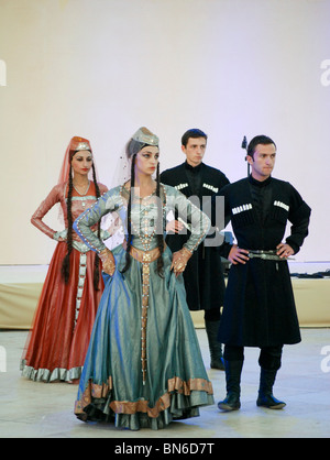 Georgian dancers dancing a folklore dance show on stage in Tbilisi ...