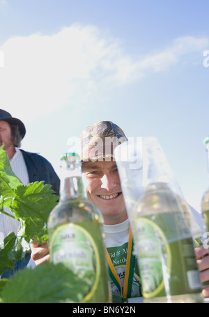 contestant at the world nettle eating championships Stock Photo - Alamy