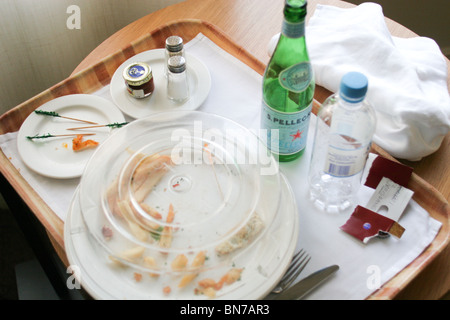 Room service in a hotel, dinner in the hotel room, steak, side dishes ...