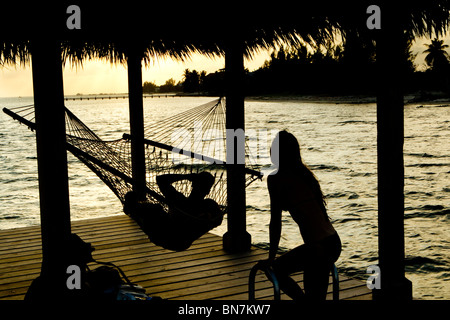 People relaxing and enjoying sunset in the mountains Stock Photo - Alamy