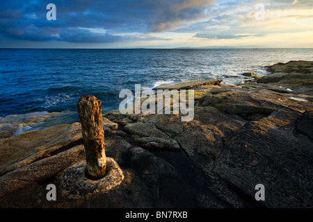 Ballast bank coastal sunset, Troon, Ayrshire Stock Photo - Alamy