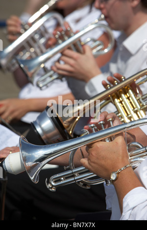 band members playing trumpets and cornets in a traditional brass band ...