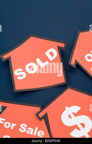 Red Sold For Sale Real Estate Sign in Front of House Stock Photo - Alamy