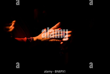 Flamenco singer clapping her hands Stock Photo - Alamy