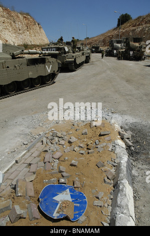 Israeli troops amass near the Israel-Lebanon border in Avivim during ...