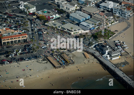 Aerial view of Newport Beach pier, homes, beach and harbor in Orange ...