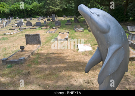 dolphin figure in wood forming part of a gravestone at east sheen ...