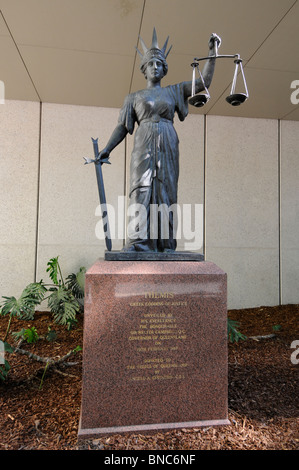 Lady Justice statue in law office. Figurine with blindfold, balance and ...