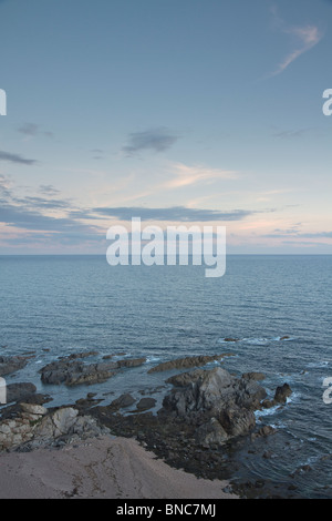 Sunset over Thurlestone rock Devon UK Stock Photo - Alamy