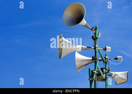 Public Address System, PA Speakers mounted on a pole outside at a ...