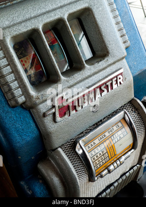 Old fashioned arcade money coin pushing machine Stock Photo - Alamy