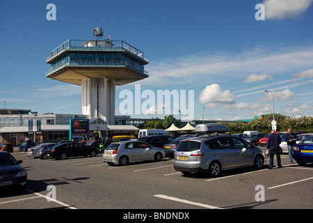 M6 motorway at Lancaster service station with footbridge over the ...