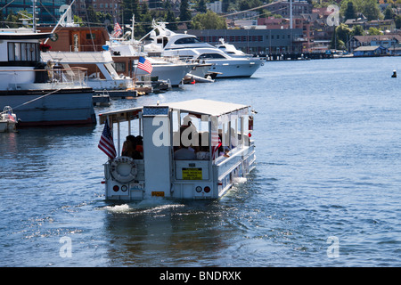 Tourists riding a DUKW or also known as Ducks, WWII amphibious vehicle ...