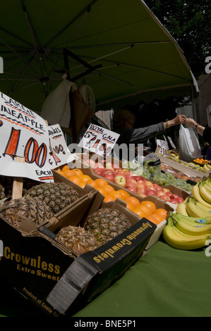 Fruit and vegetable market stalls on Market Walk in Woking town centre ...