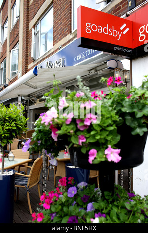 Al Fresco Dining and Estate Agents Sign Stock Photo - Alamy