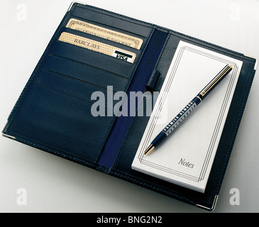 Pen and wallet Stock Photo - Alamy